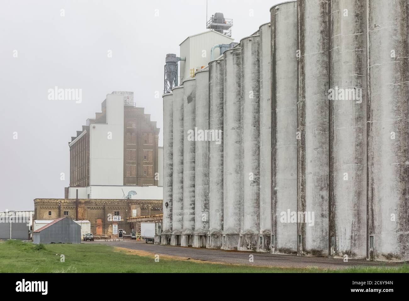 Grain silos of the Hansen Mueller Grain Co. on the gritty waterfront of ...