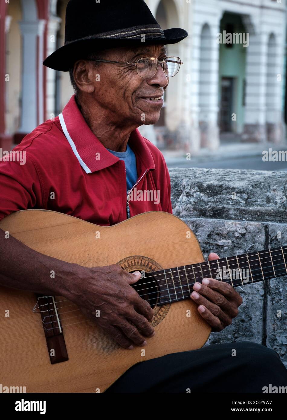 HAVANA, CUBA - CIRCA JANUARY 2020: Cuban man playing guitar in Paseo ...