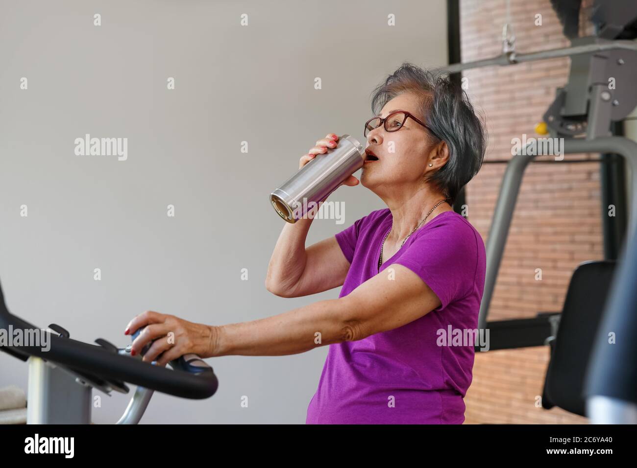 senior woman doing exercises in gym Stock Photo - Alamy