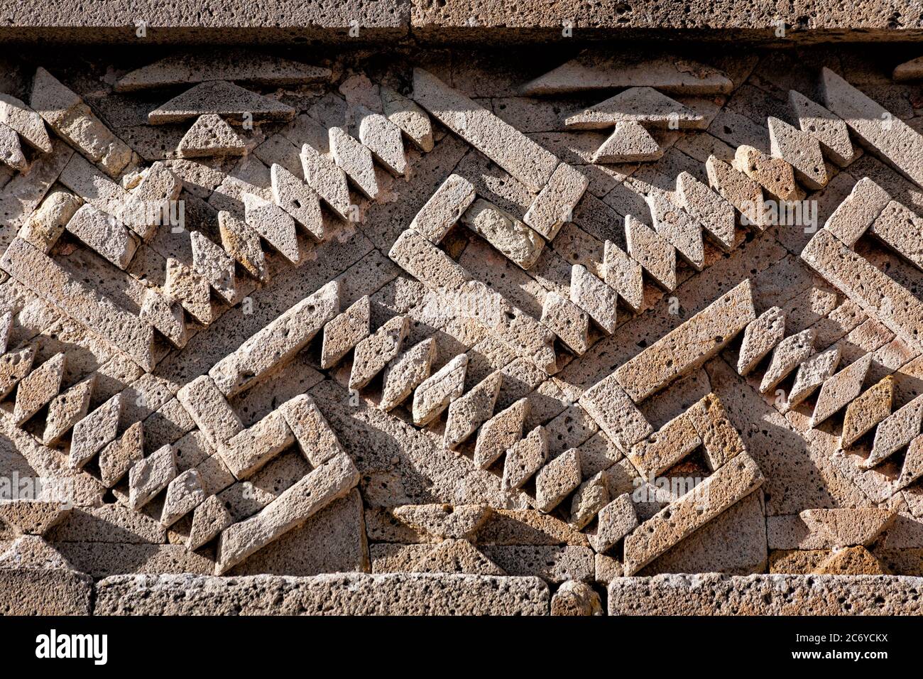 Detail of the ancient glifos on the walls of the MItla Ruins in Oaxaca ...
