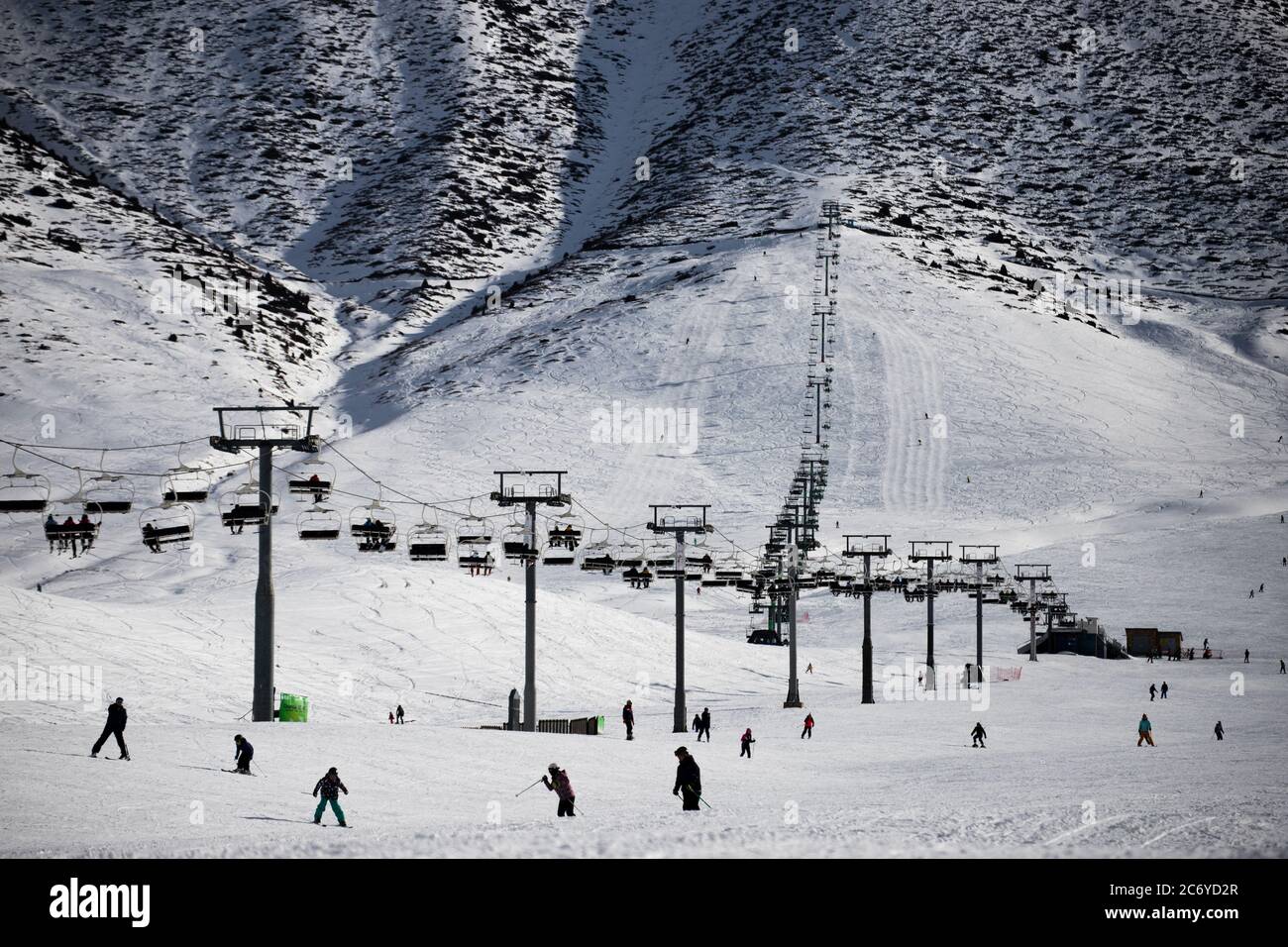 Tourists and sportsmen explore the pistes of Chunkurchak Ski Base in ...