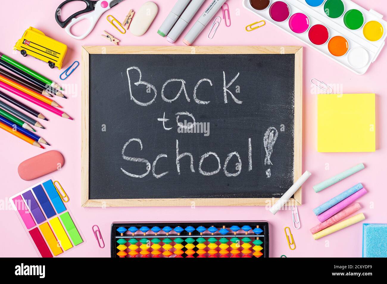Concept Back To School Color Chalk Pencil Notebook Stationery on pink ...