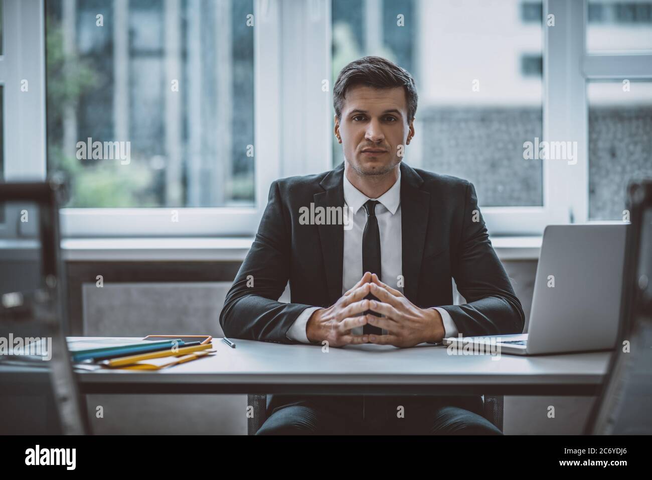CEO sitting at his office while working Stock Photo - Alamy