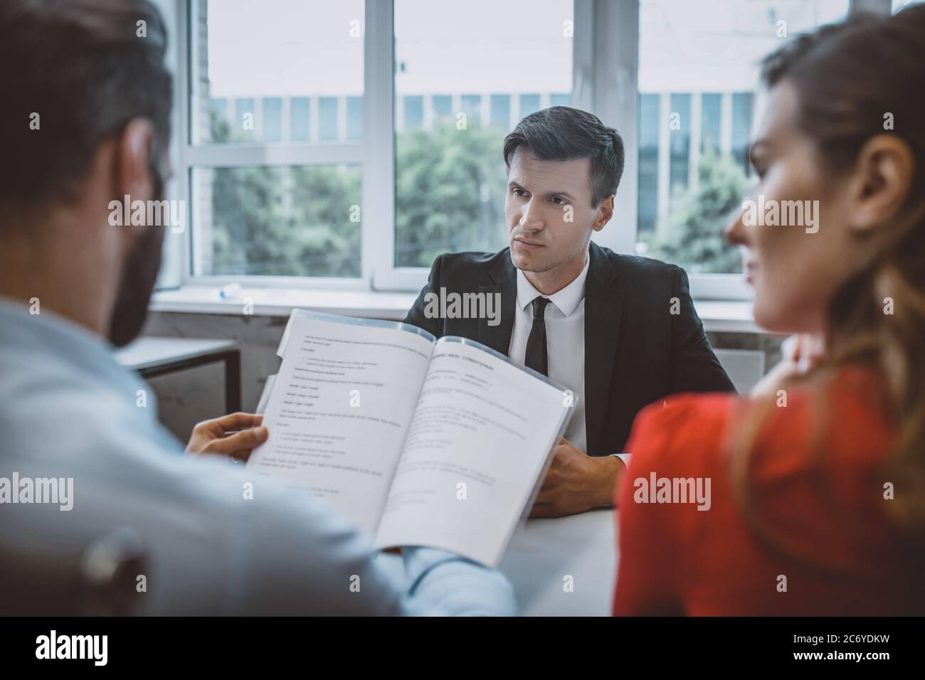 Male boss talking to female employee hi-res stock photography and ...