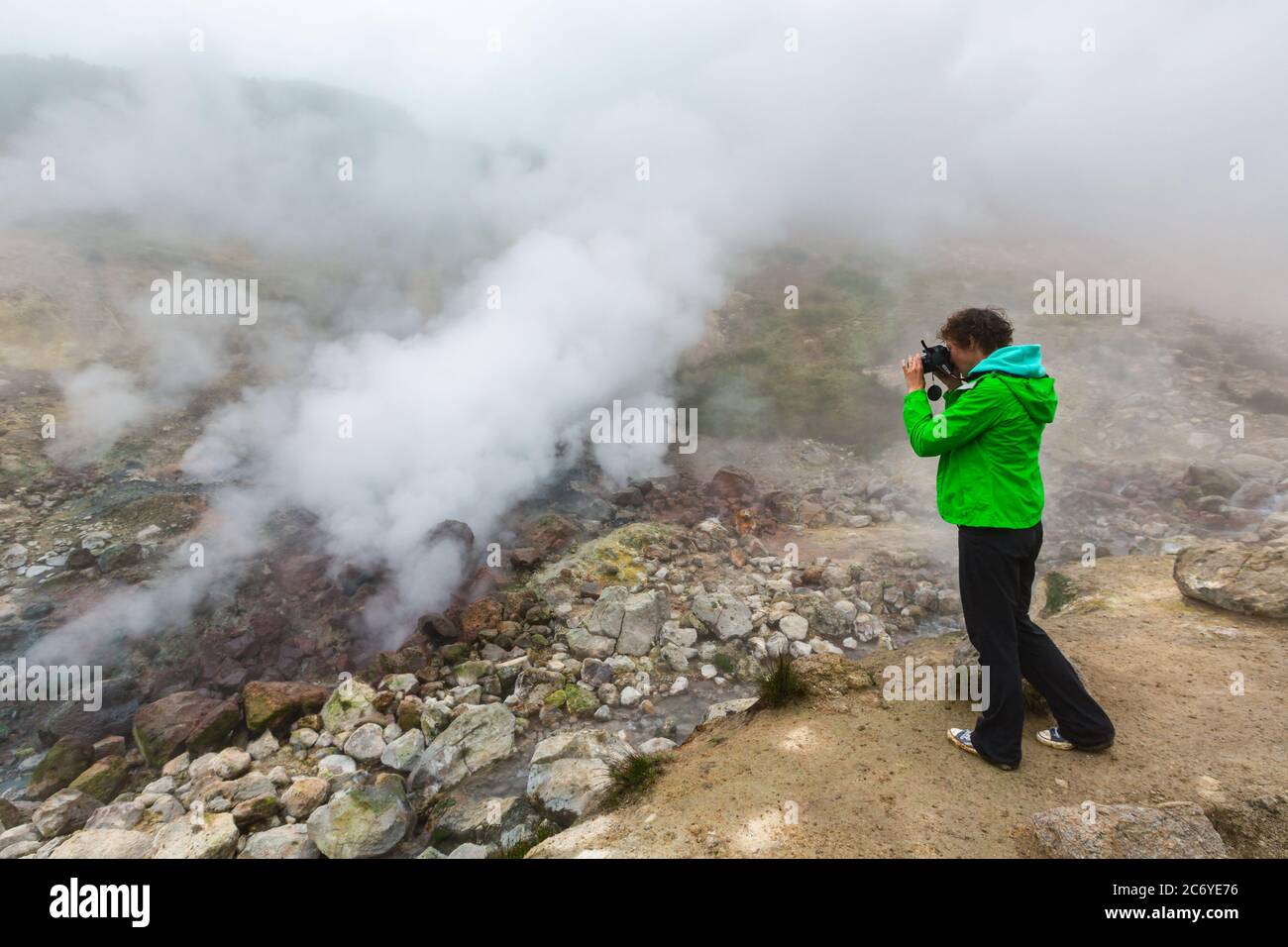Girl photographer takes pictures of stunning volcanic landscape ...