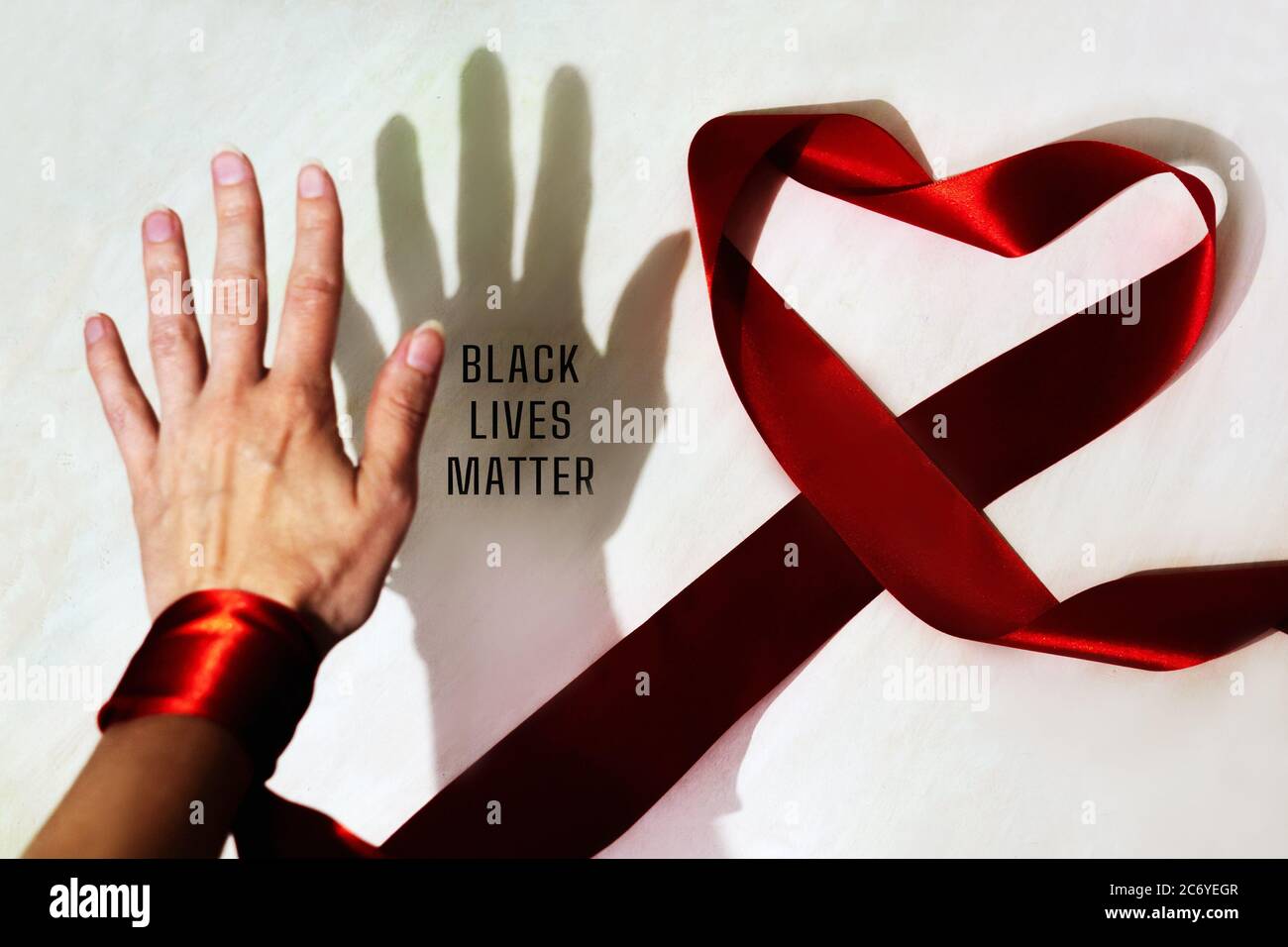 Black shadow and white palm and inscription Black Lives Matter. Heart ...
