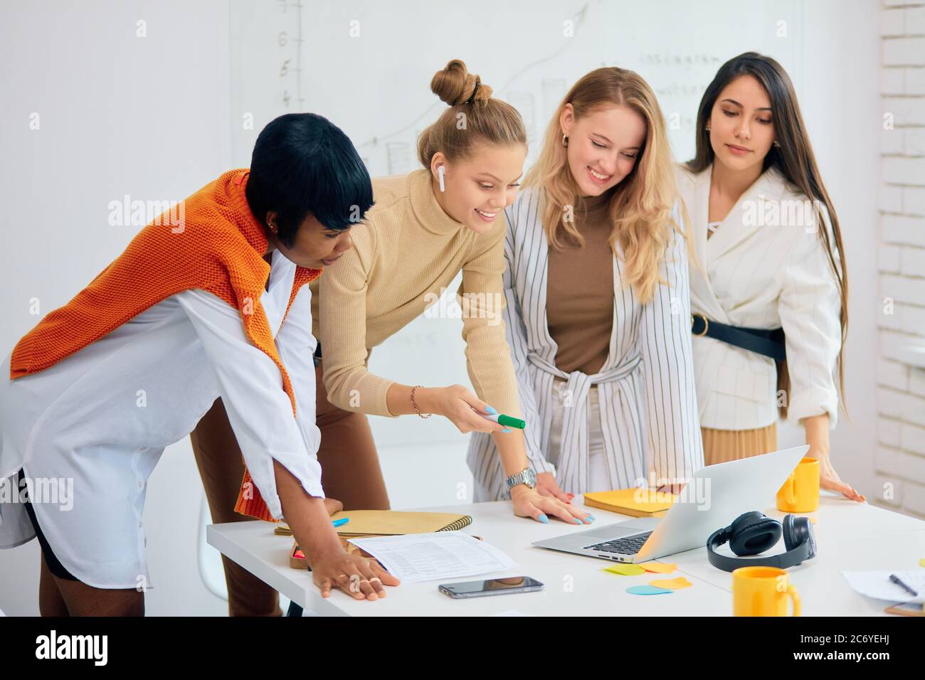 Creative female managers, female teamwork of diverse people in modern ...