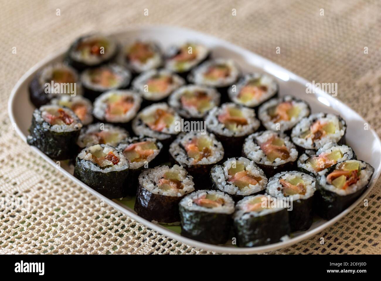 Top view of stack of Japanese sushi maki roll plate. Served in Japanese ...