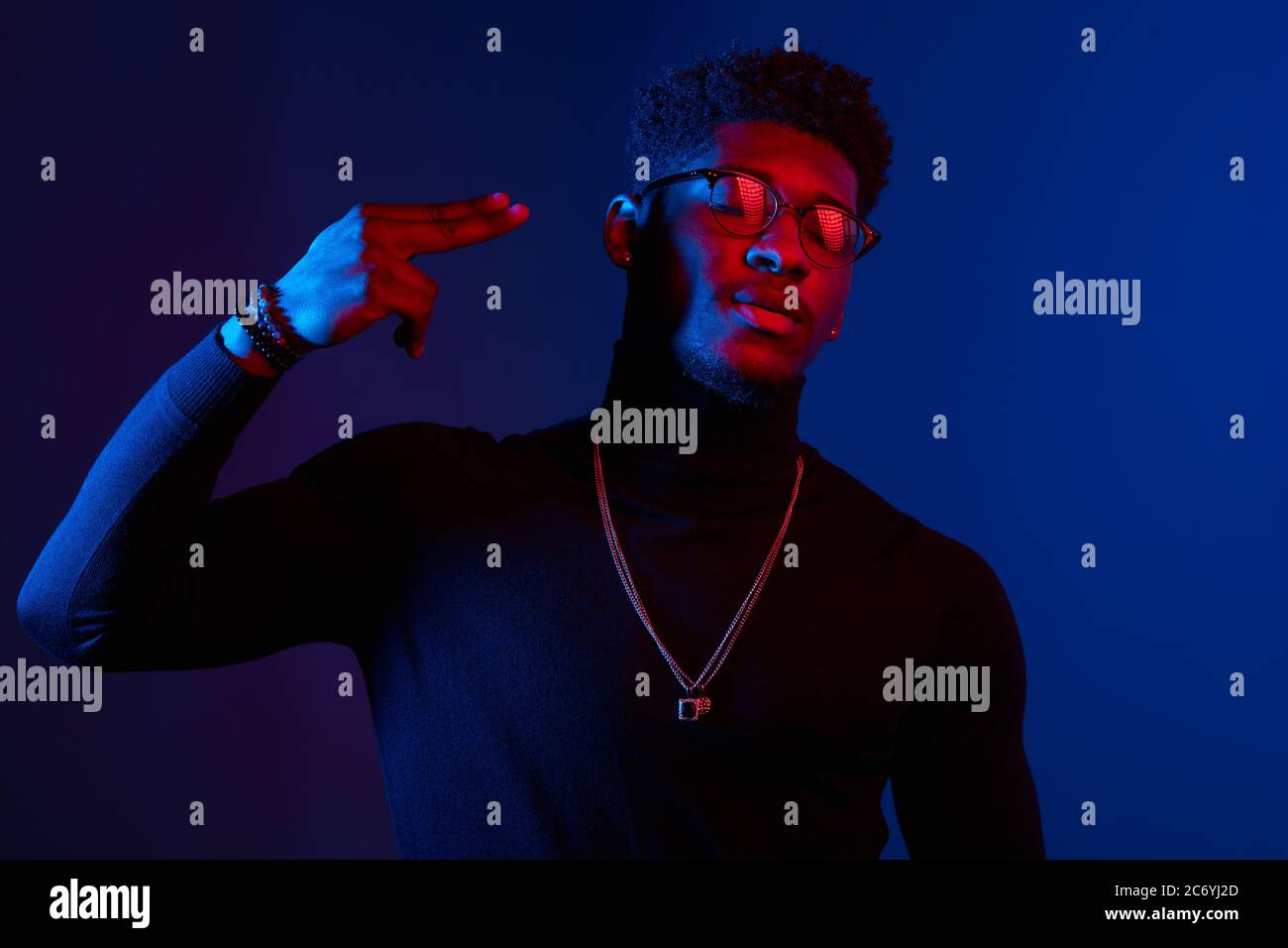 Portrait happy man imitating gun hi-res stock photography and images ...