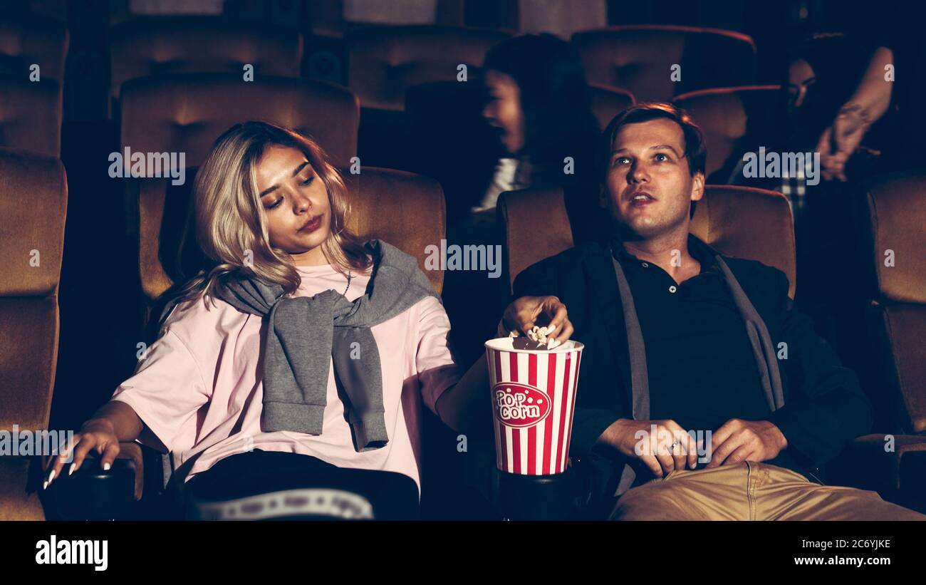 Walking to seats movie theater hi-res stock photography and images - Alamy