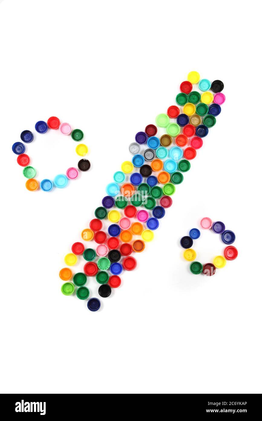 percent sign from the plastic caps isolated on the white background ...