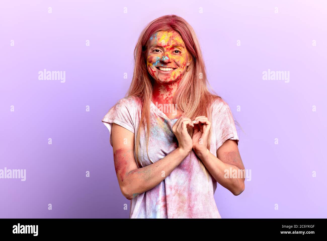 positive attractive girl expresses her warm tender feeling and emotion ...