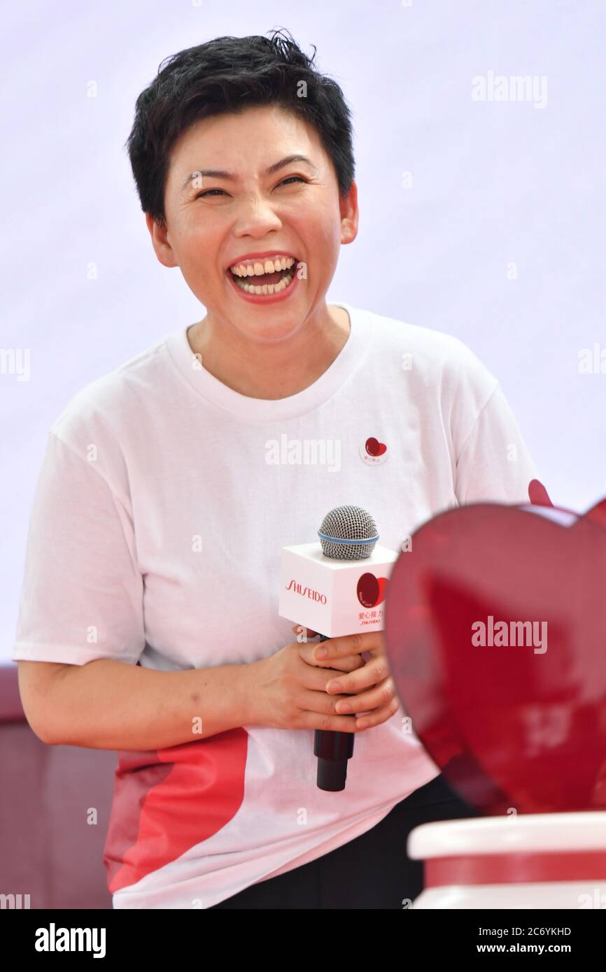 Chinese actor Huang Xuan attends a charity activity of a cosmetic brand ...