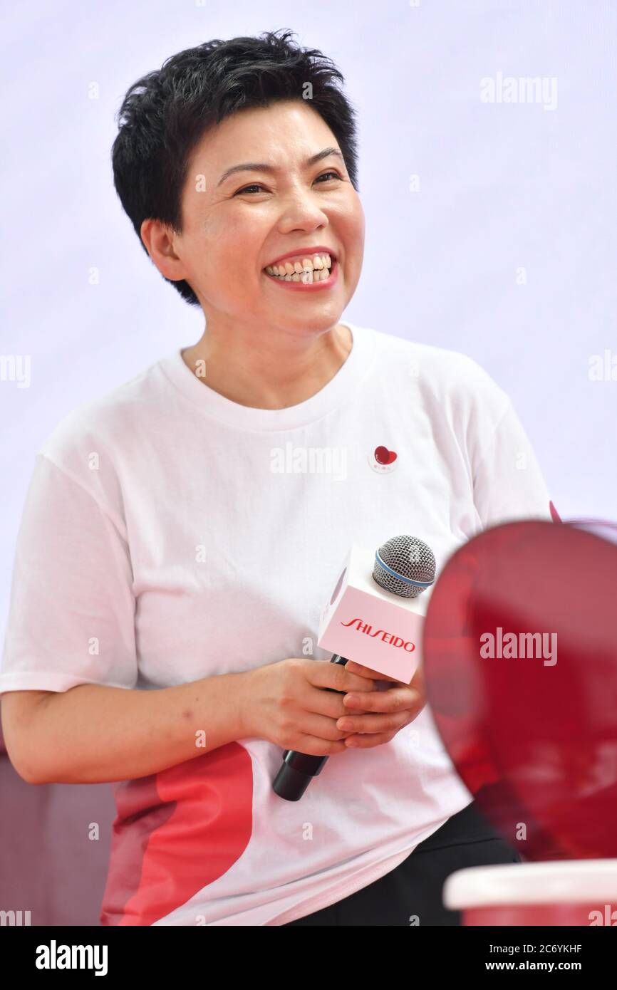 Chinese actor Huang Xuan attends a charity activity of a cosmetic brand ...