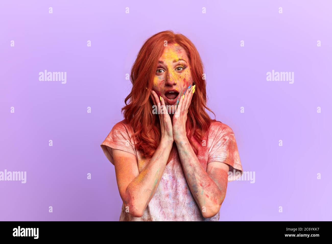 surprised shocked ginger woman with wide open mouth looking at the ...