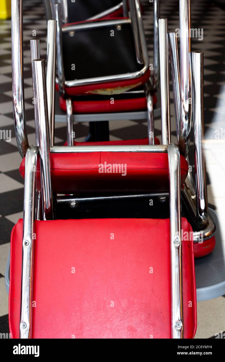 Restaurant with chairs stacked on tables closed for the retail sector ...