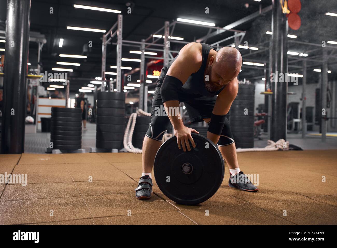 Woman bending steel bar hi-res stock photography and images - Alamy