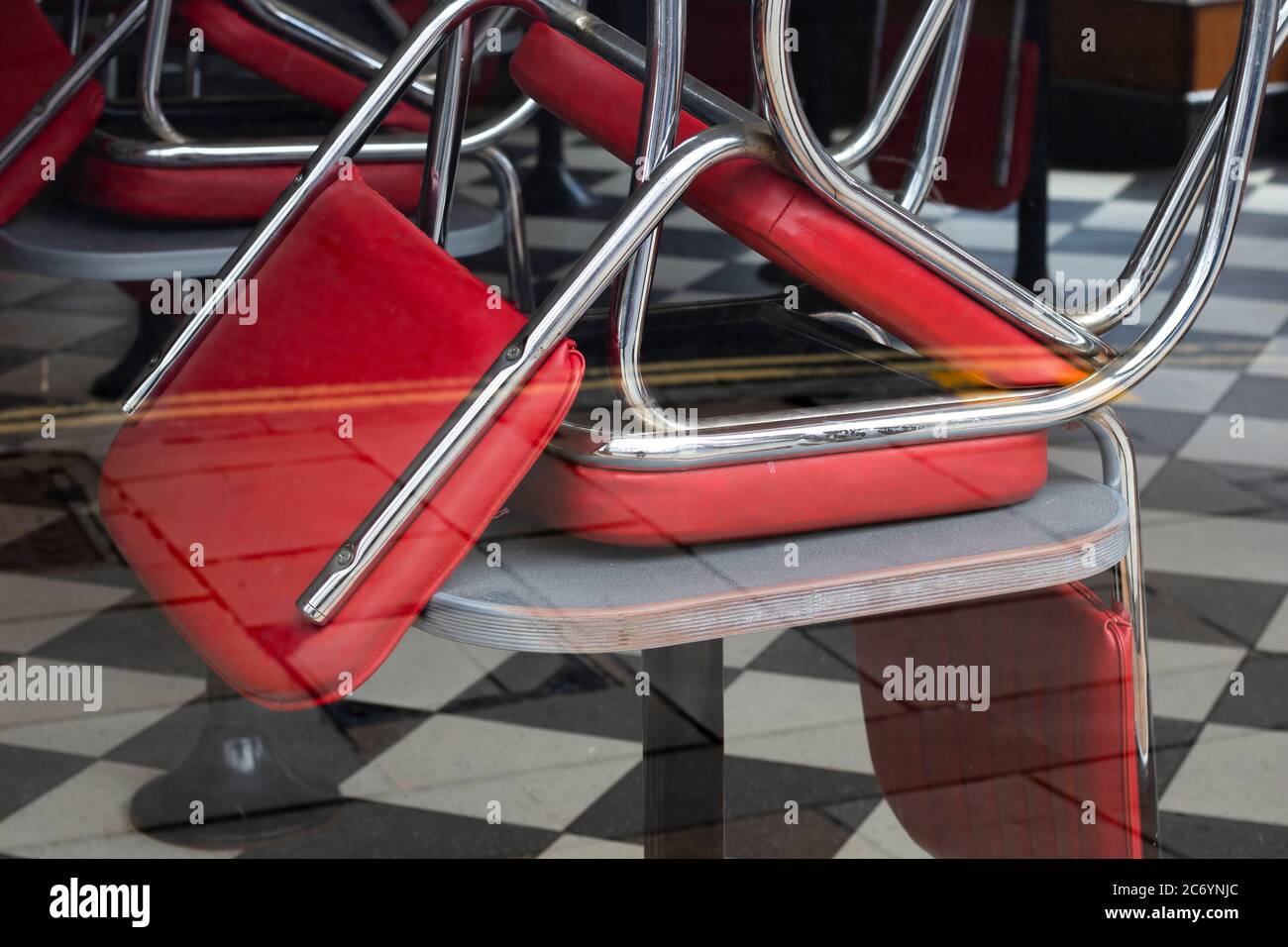 Restaurant with chairs stacked on tables closed for the retail sector ...