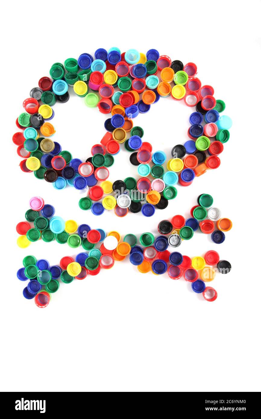 human skull from the plastic caps isolated on the white background ...