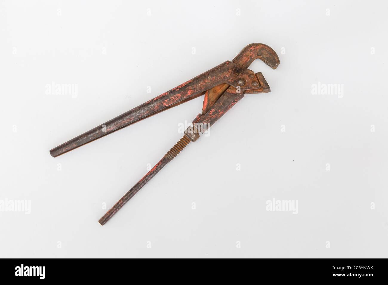 Old plumbing key isolated on white background. Home, adjusting Stock ...