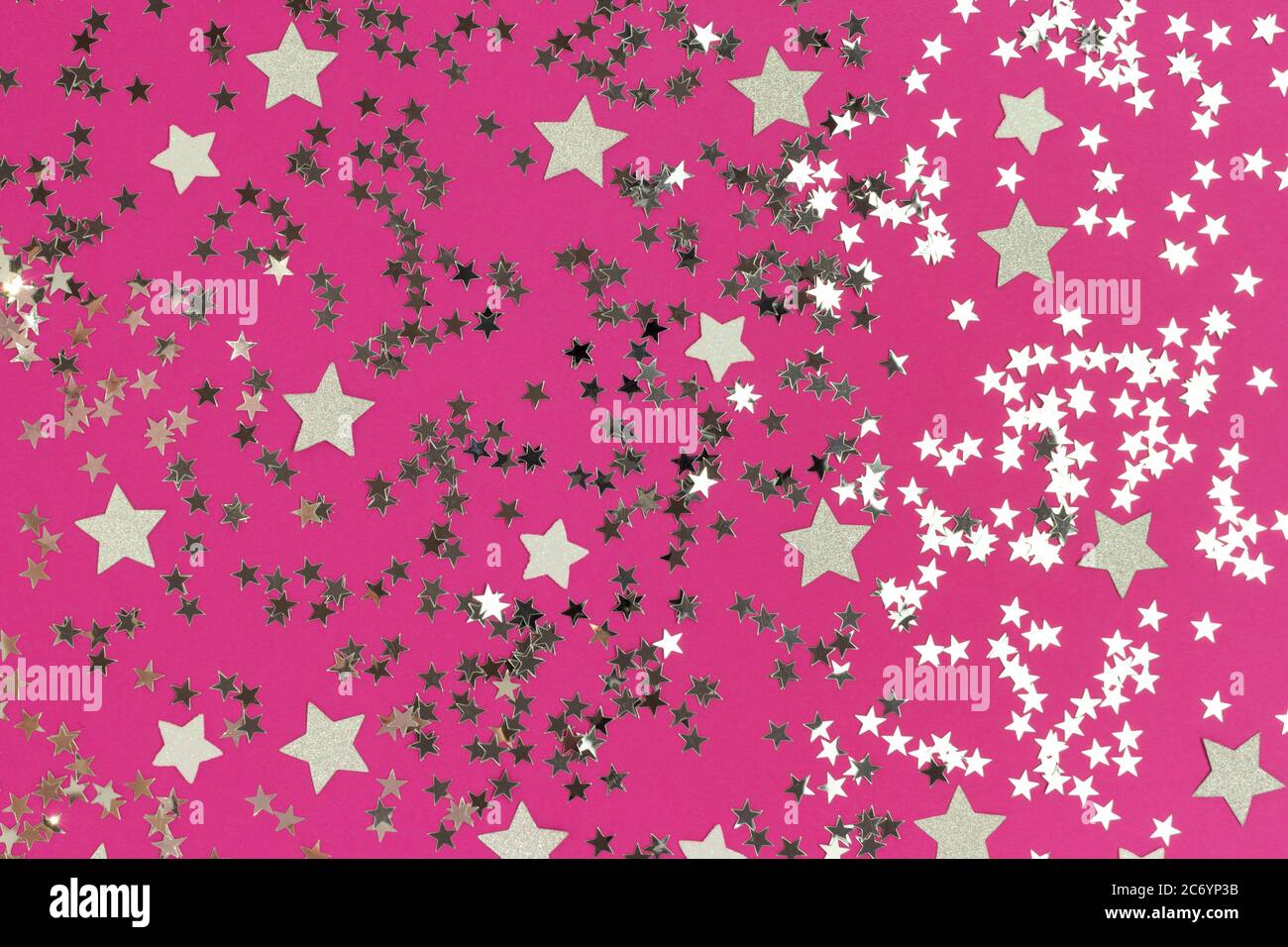 Silver shiny stars on a magenta background. Festive backdrop for your ...
