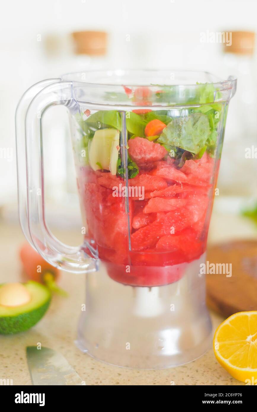 Fresh vivid watermelon smoothie ingredients and blender Stock Photo - Alamy