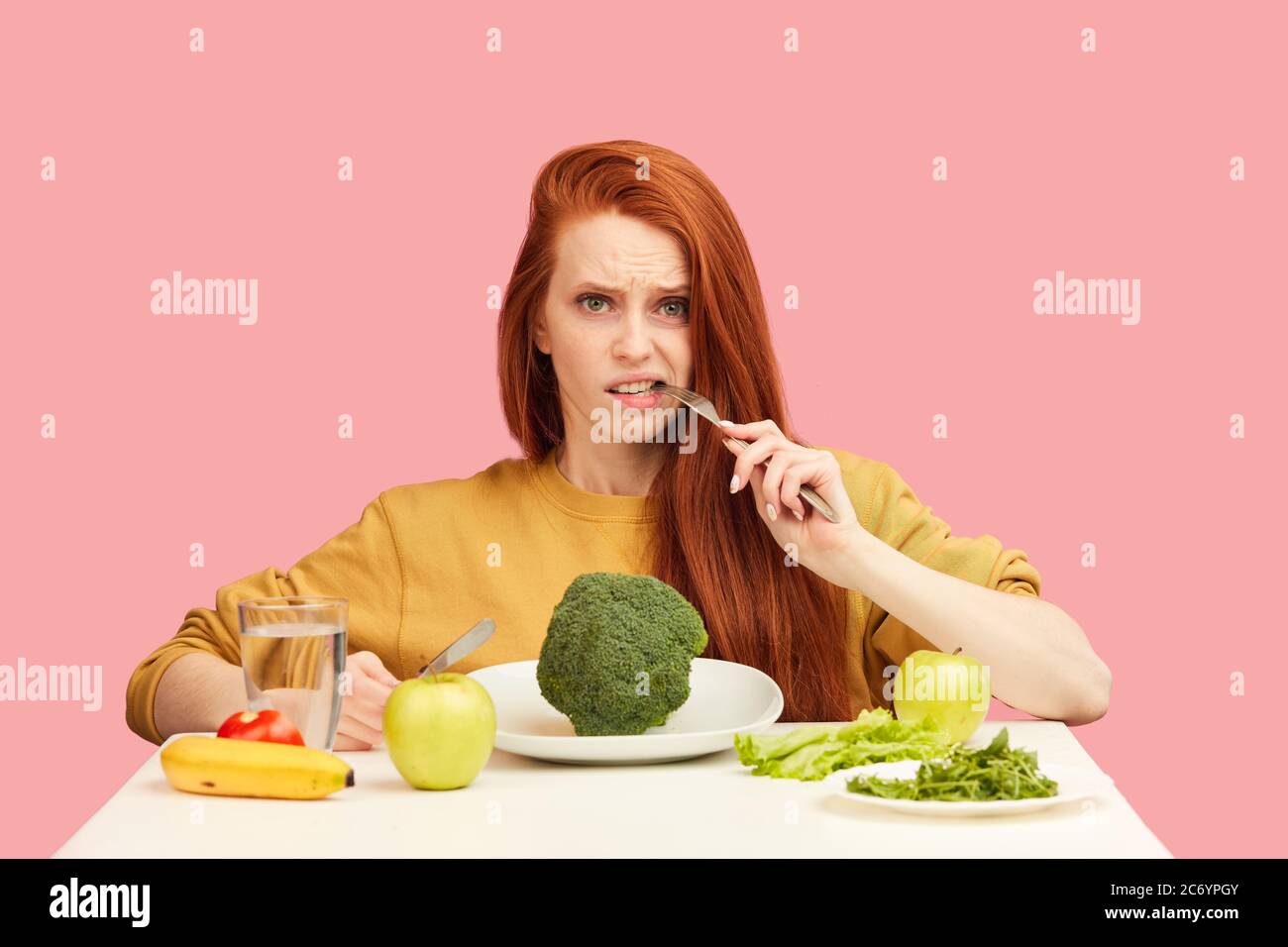 Redhead frustrated confused disgusted displeased female model makes a ...