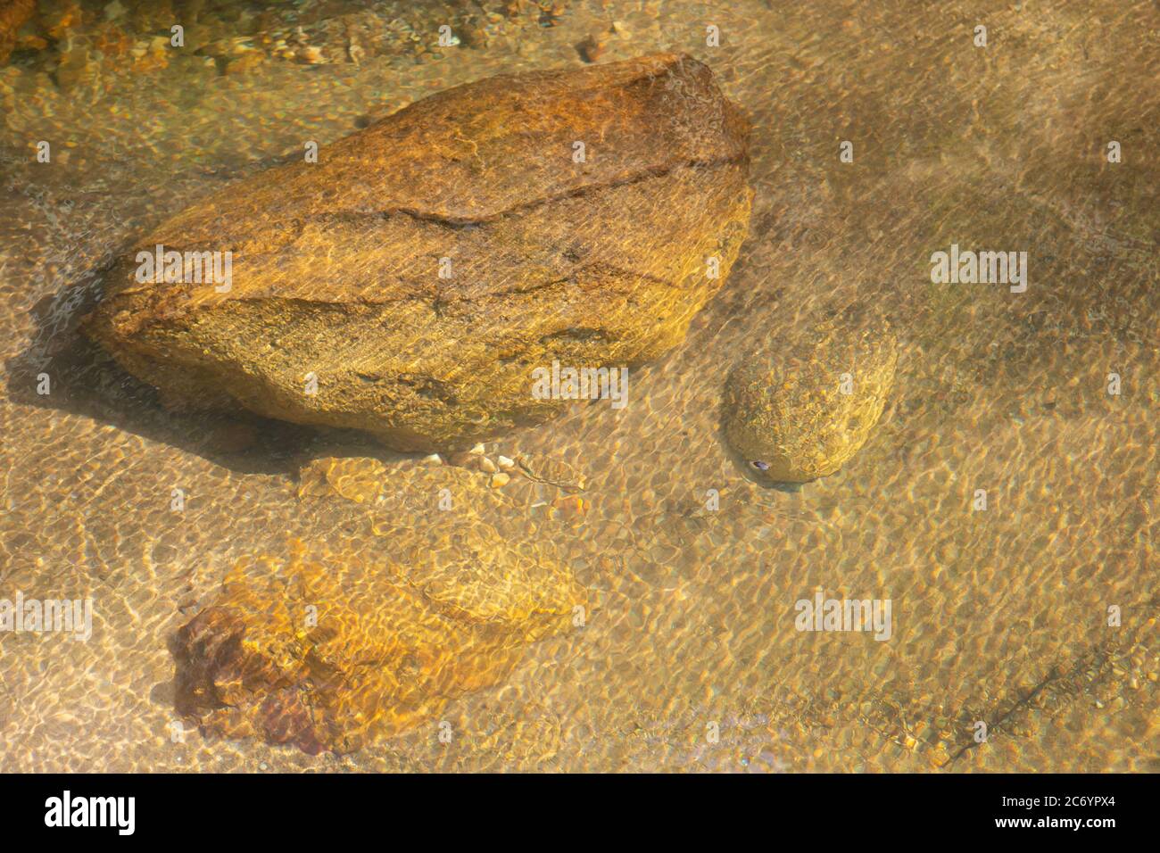 The photo through the water layer on the underground Stock Photo - Alamy