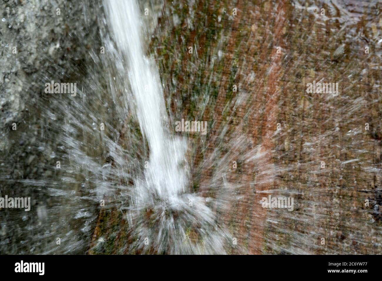 open outdoor water tap spreading macro detail Stock Photo - Alamy