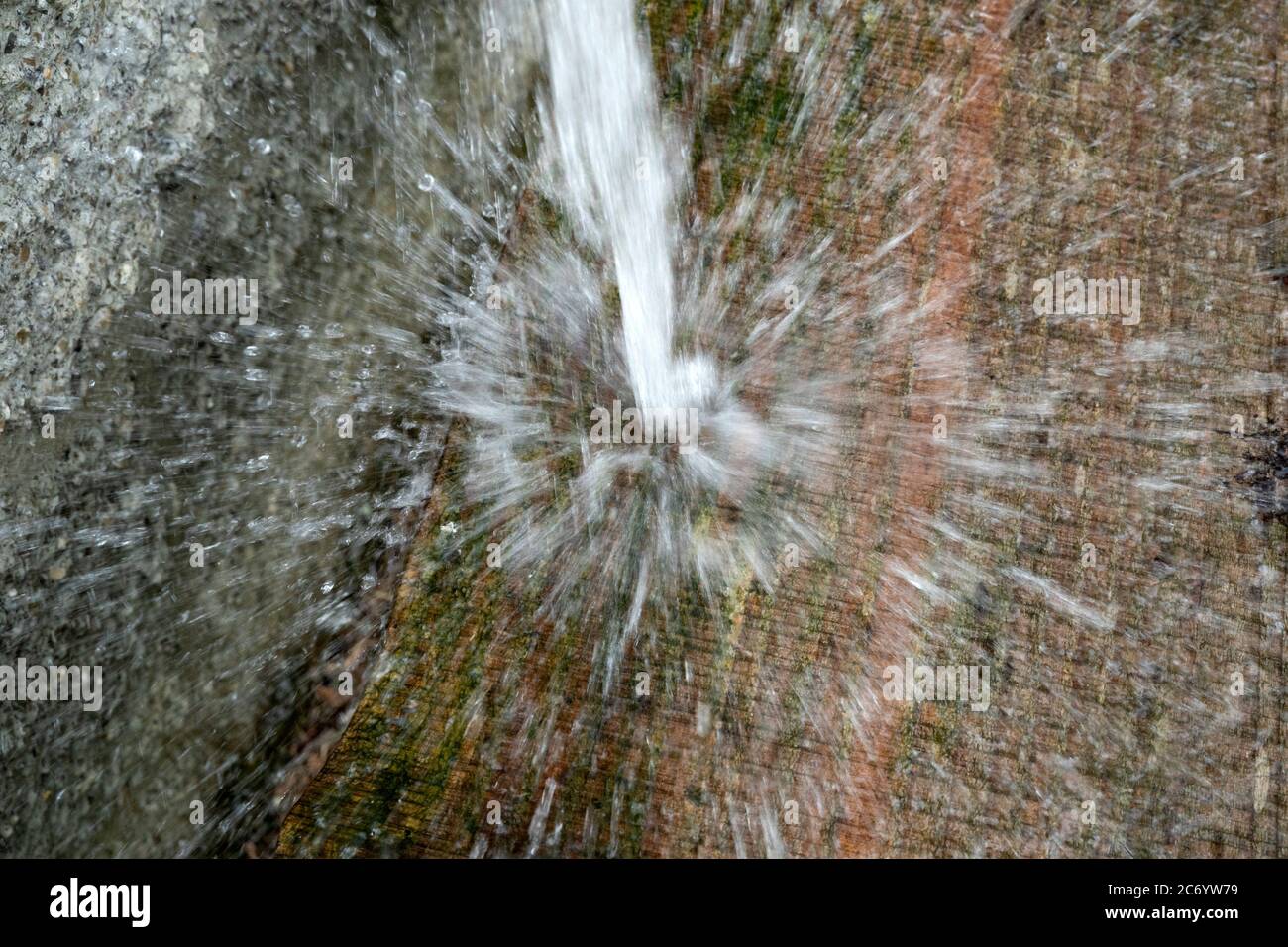 open outdoor water tap spreading macro detail Stock Photo - Alamy