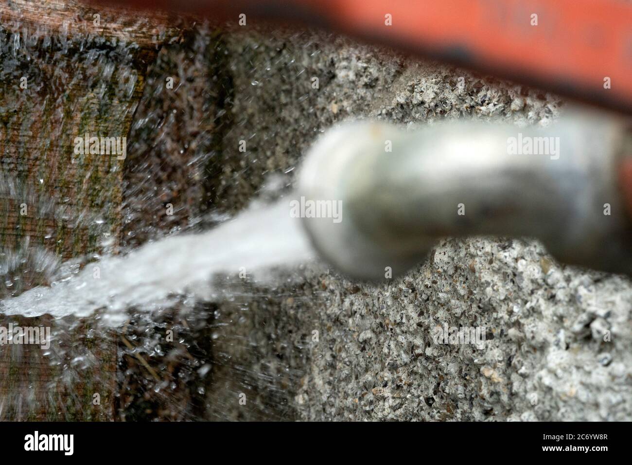 open outdoor water tap spreading macro detail Stock Photo - Alamy