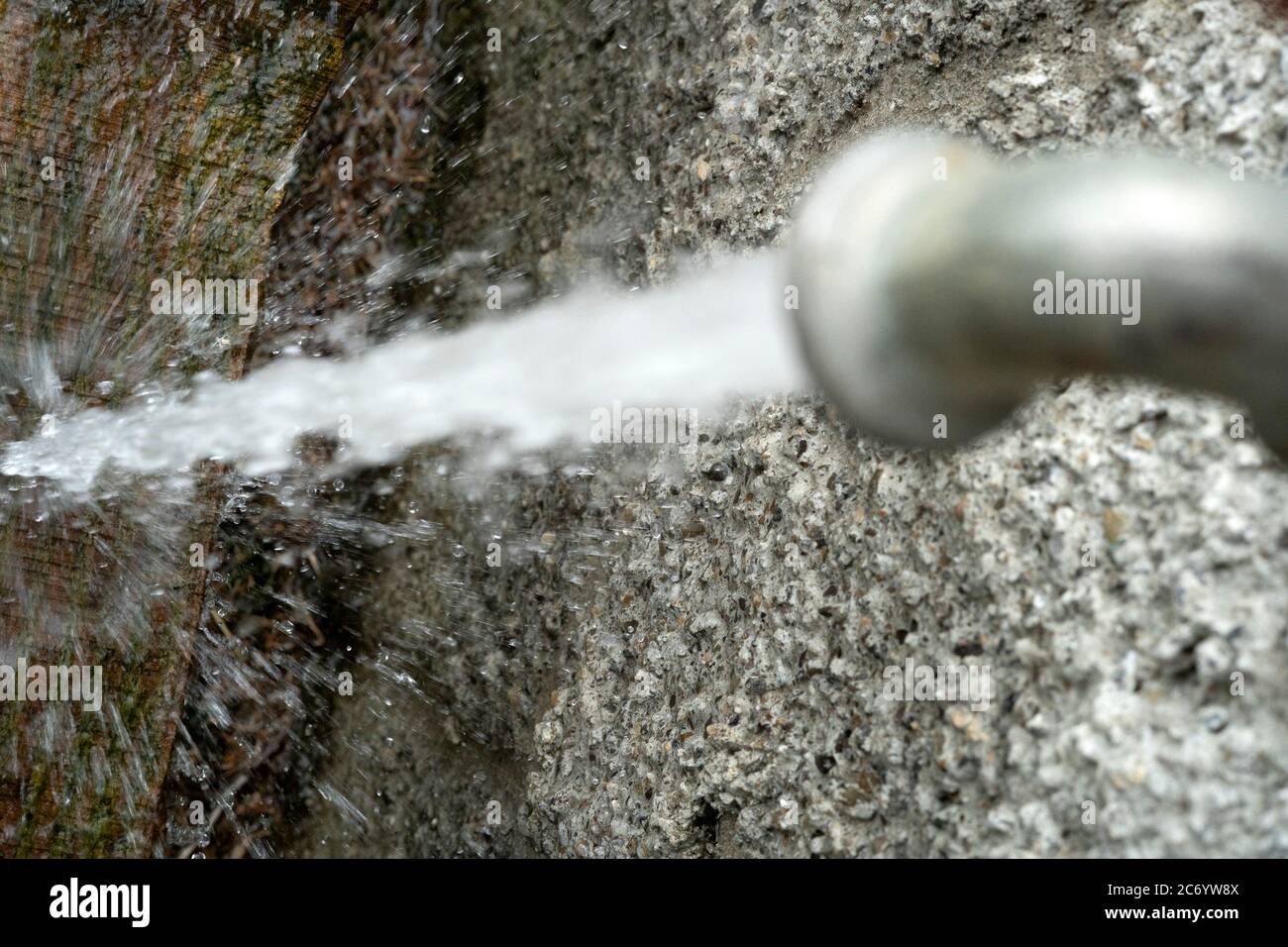 open outdoor water tap spreading macro detail Stock Photo - Alamy