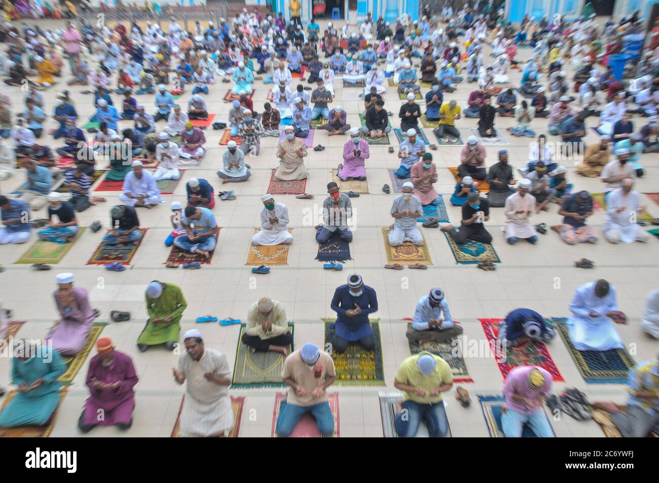 Muslims attending Friday prayers during the coronavirus pandemic at ...