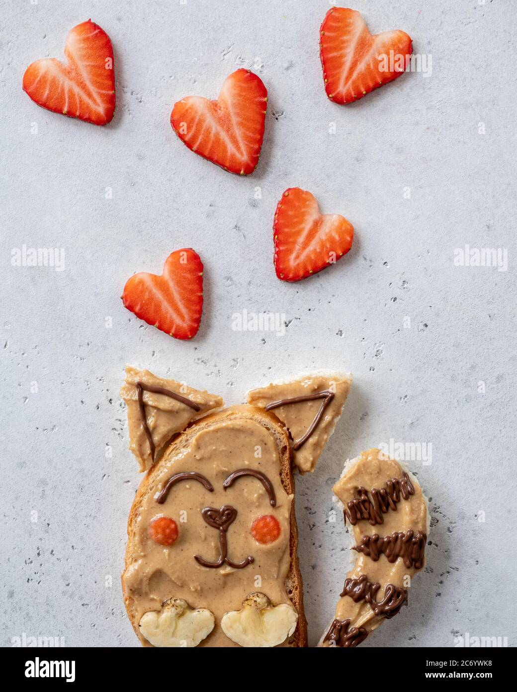 Funny cat sandwich with peanut butter, banana and strawberry Stock ...