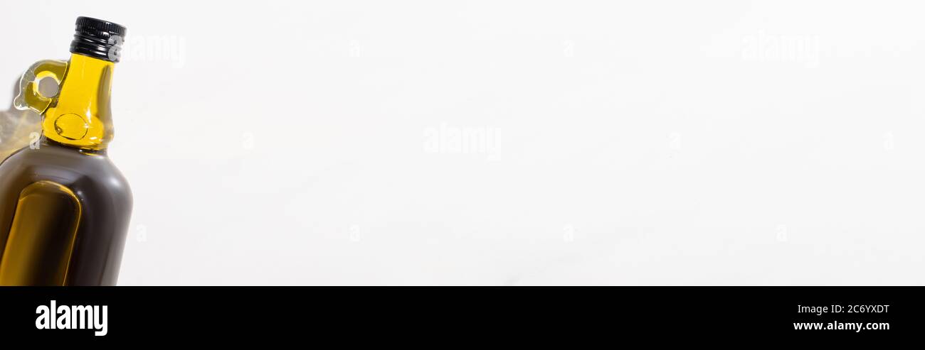 top view of olive oil in bottle on white background, panoramic ...