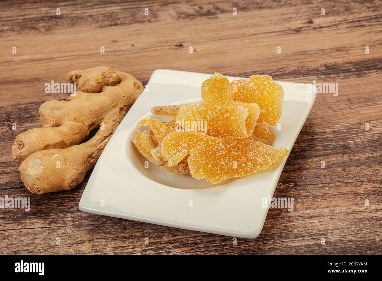 Dry sweet ginger snack in the bowl Stock Photo - Alamy