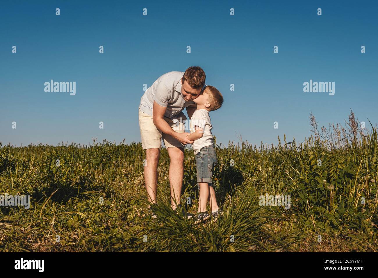 Kissing in secret hi-res stock photography and images - Alamy