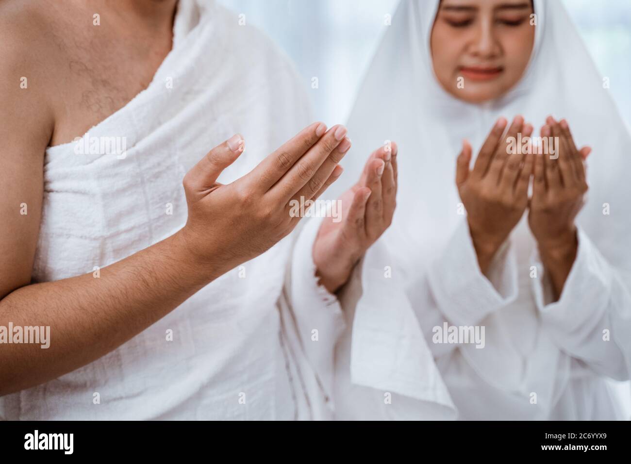 close up hand muslim praying open their arm wearing ihram Stock Photo ...