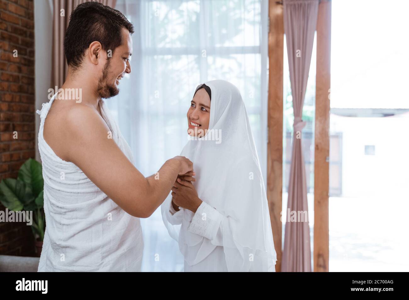 traditional culture shake hand wife kiss husband's hand after praying ...