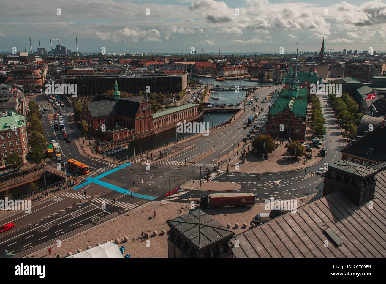 High angle view of Copenhagen city with road, canal and cloudy sky at ...