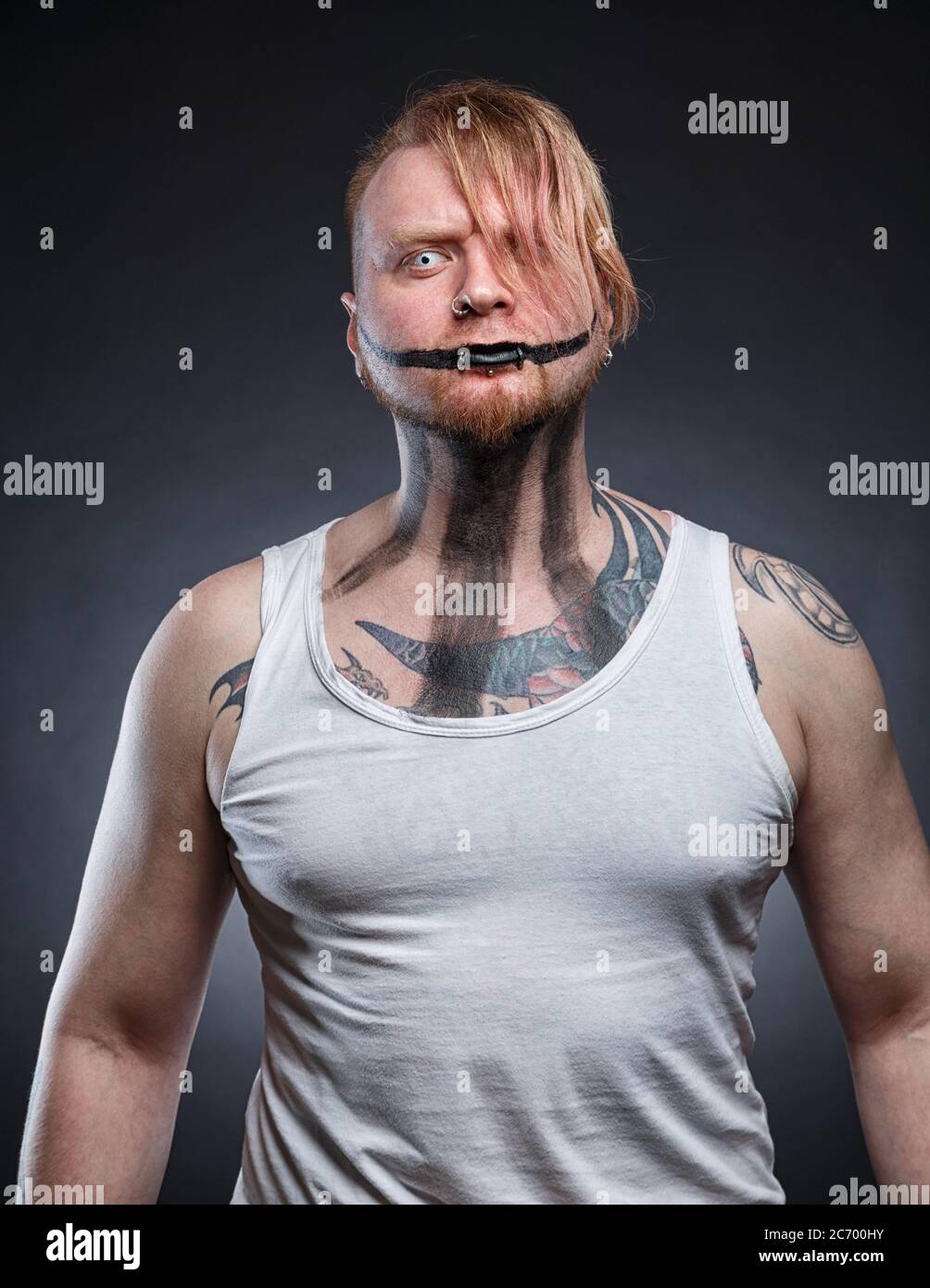 Picture of a tattooed scary mad with horror make-up Stock Photo - Alamy