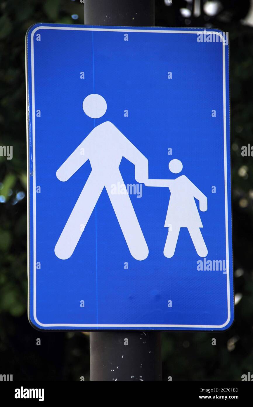 Sign street pedestrian walk blue Stock Photo - Alamy