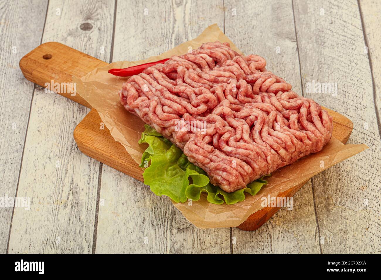 Raw Minced pork meat for cooking in the board Stock Photo - Alamy