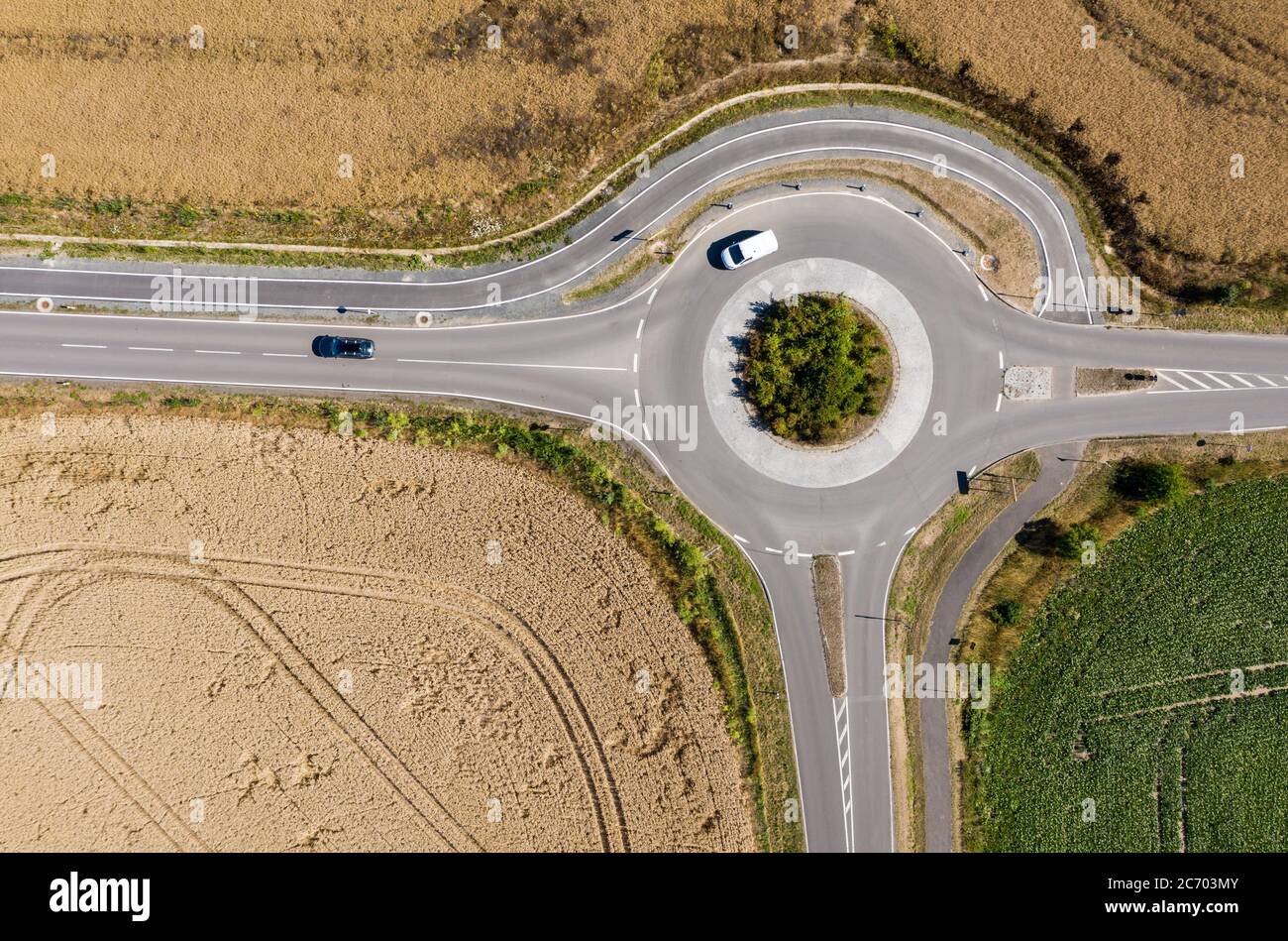 Espenhain, Germany. 13th July, 2020. Two cars drive through a ...