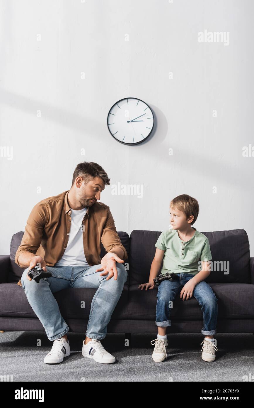 Child and parent confused hi-res stock photography and images - Alamy