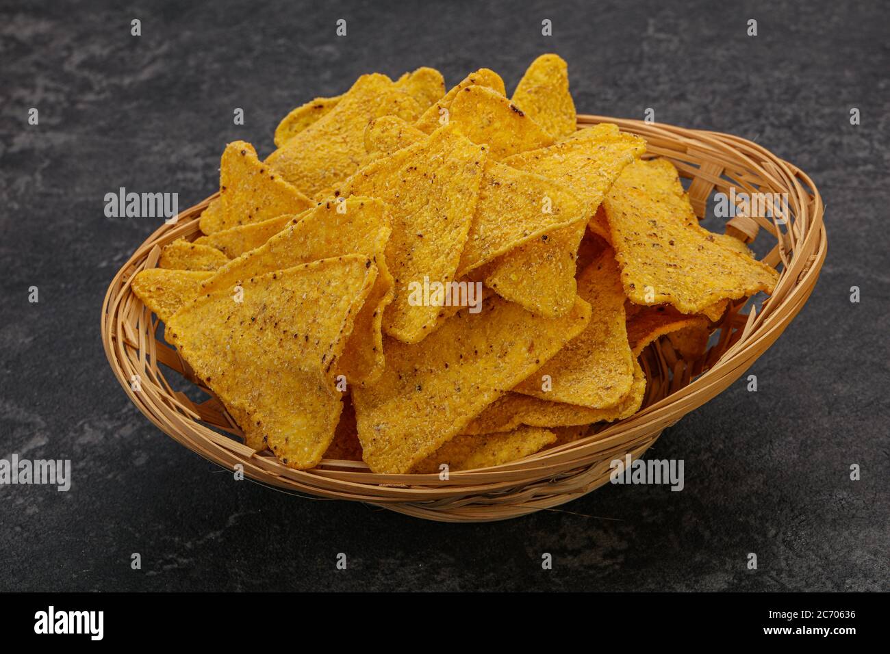 Mexican crunchy corn nachos triangle heap Stock Photo - Alamy