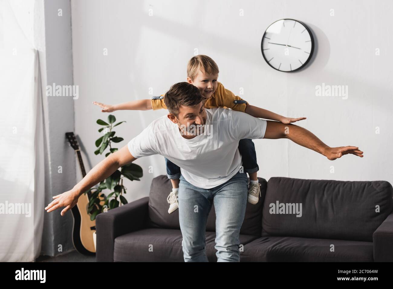 Child imitating parent hi-res stock photography and images - Alamy