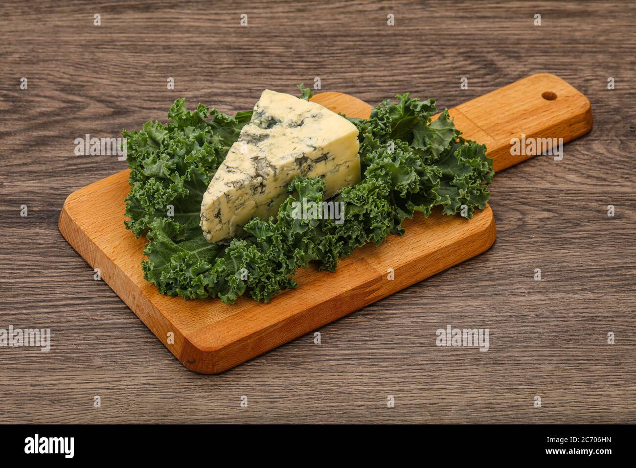 Dairy Blue cheese triangle with mold Stock Photo - Alamy