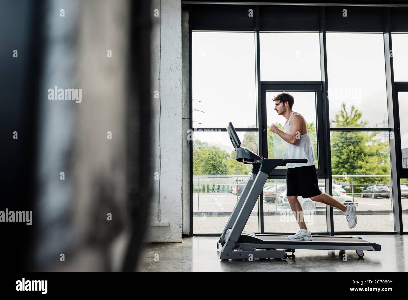 Person on treadmill profile view hi-res stock photography and images ...