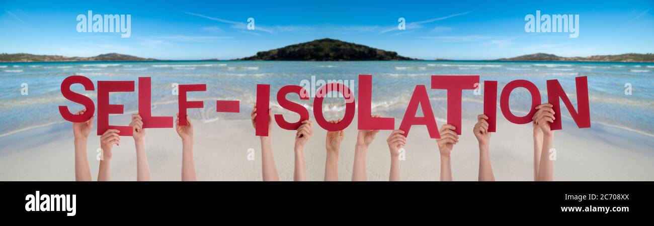 People Hands Holding Word Self-Isolation, Ocean Background Stock Photo ...